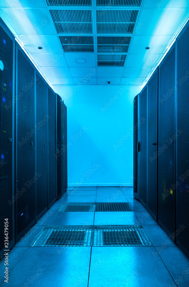 Server room with blue light in a data center Stock Photo | Adobe Stock