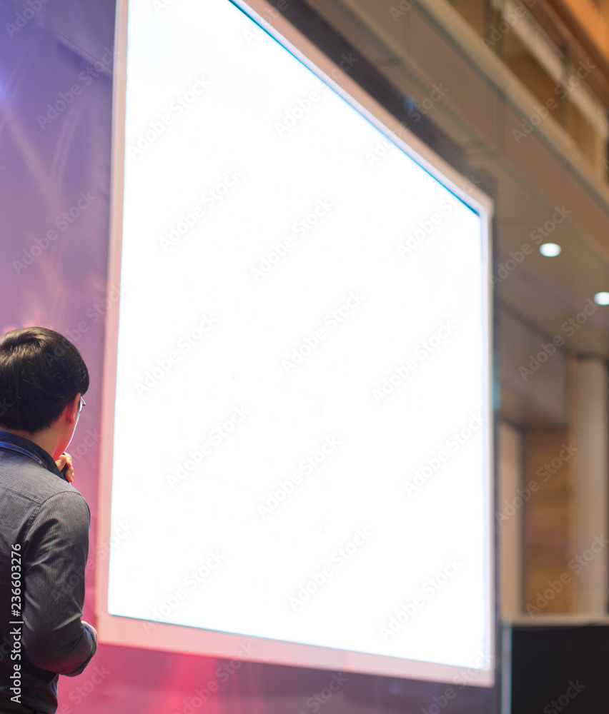 Blank White Screen Getting Looked at by Presenter for Message or ...