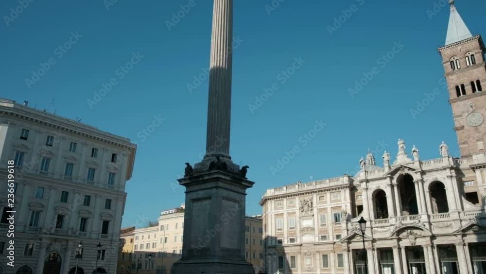 Low angle camera pan right base of Egyptian obelisk to the front of the ...