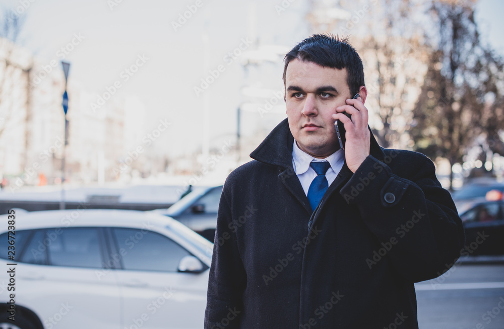 Worried man with overweight at city streets. Life of businessman or ...