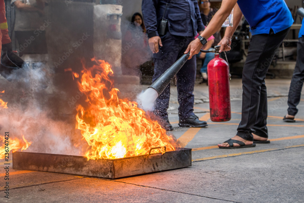 Employees firefighting training,Extinguish a fire. Stock Photo | Adobe ...