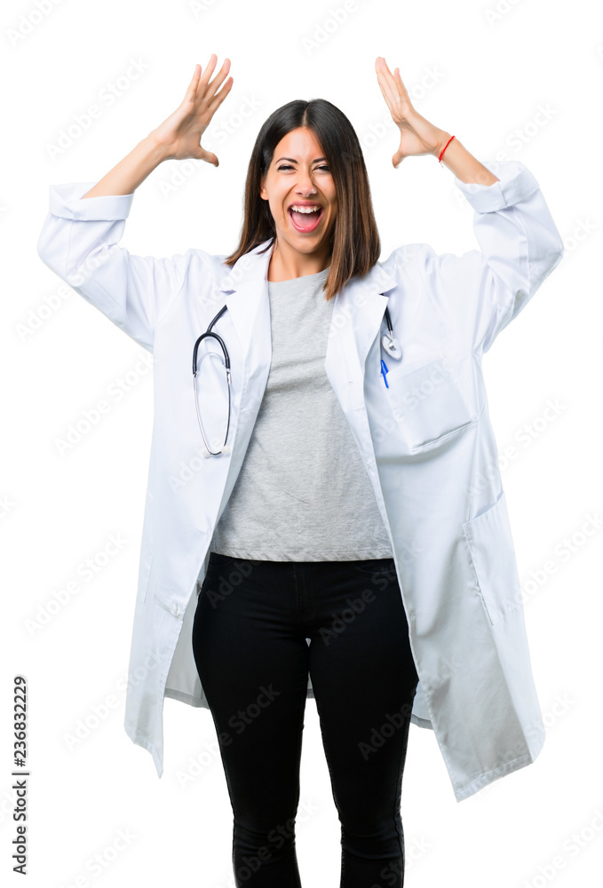 Doctor woman with stethoscope with surprise and shocked facial ...