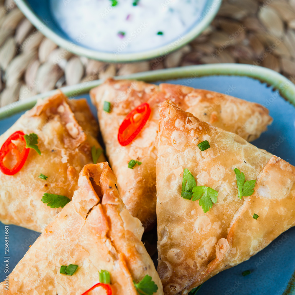 Indian Spicy Vegetable samosa with Mint Yoghurt Raita. Stock Photo ...