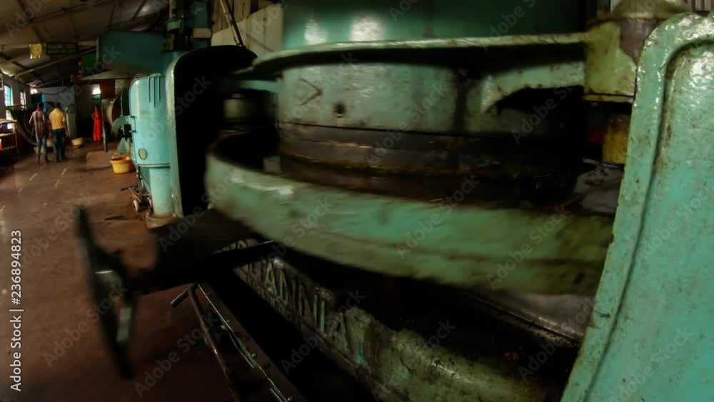 Tea factory vintage rolling machines circular movements workers go on ...