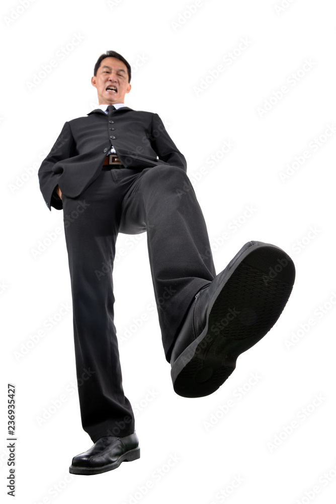 businessman walking cross. Low-angle shot. Stock Photo | Adobe Stock businessman walking cross. Low-angle shot. Stock Photo | Adobe Stock