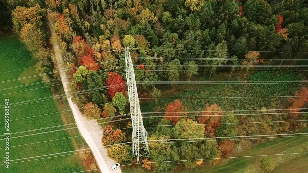 Aerial shot of overhead power line in autumn landscape Stock Video ...