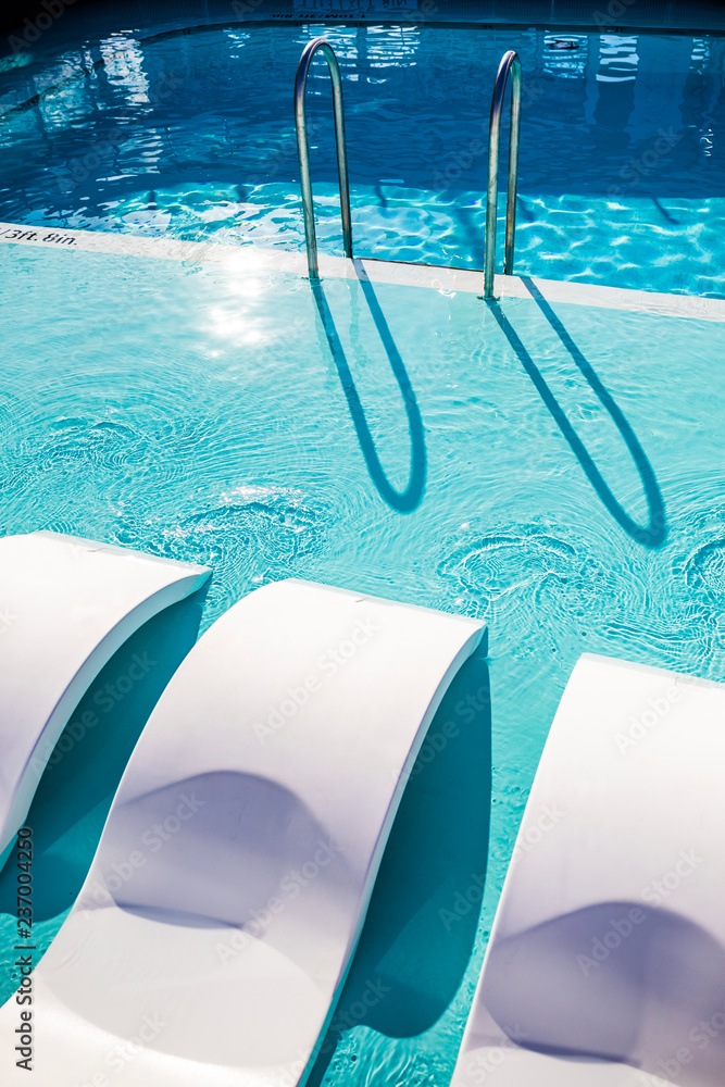 Pool Loungers Stock Photo | Adobe Stock