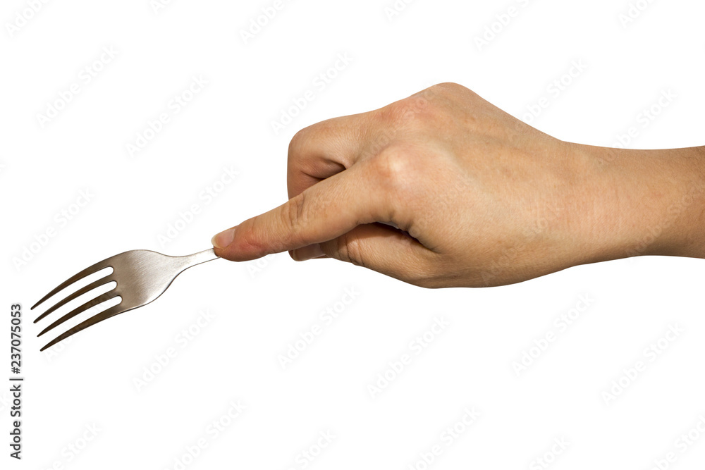Fork in a hand on a white background isolation Stock Photo | Adobe Stock