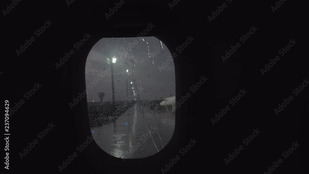 A slowmotion view from a moving plane opened porthole. It is absolutely ...