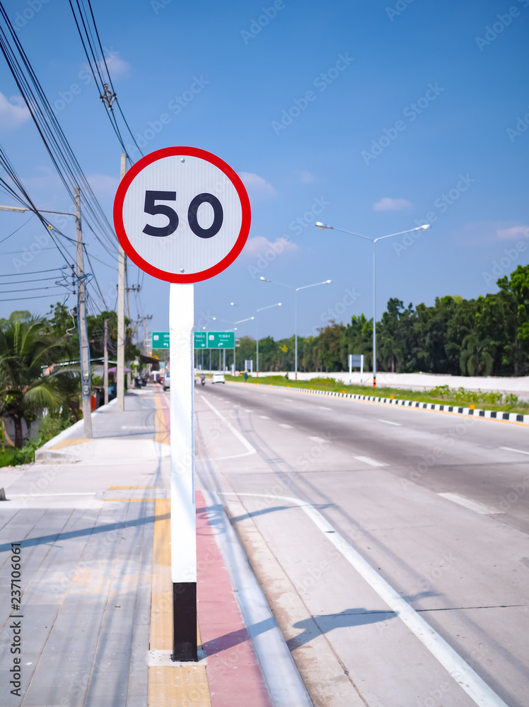 Speed limit warning not exceeding fifty kilometer per hour, Traffic sign panel 50 km/hr on the ...