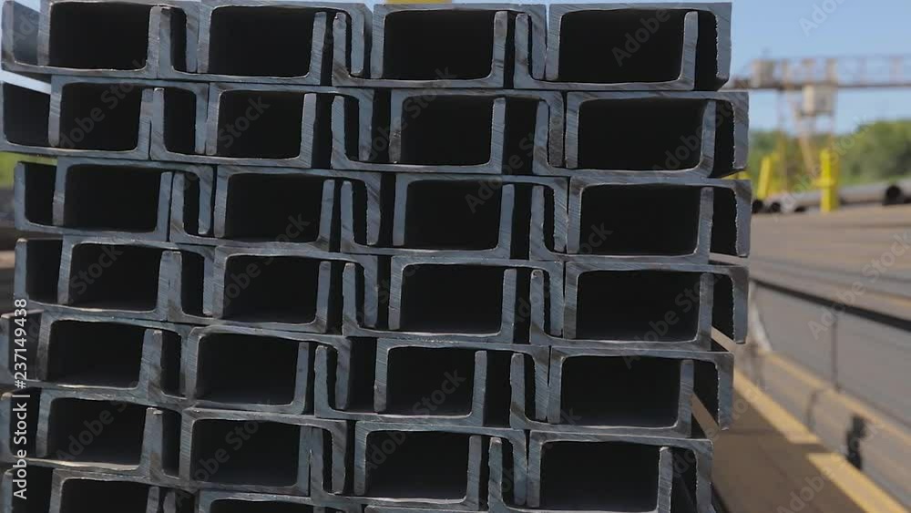The metal channel laid in rows in the open metal warehouse, the large ...