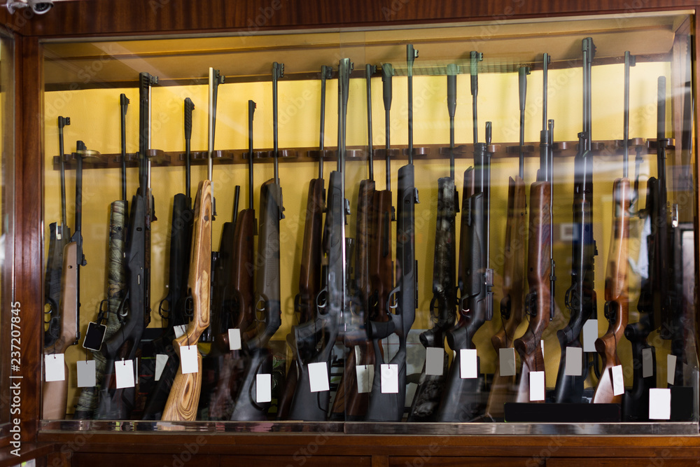 Gun store interior with specialized rifles Stock Photo | Adobe Stock