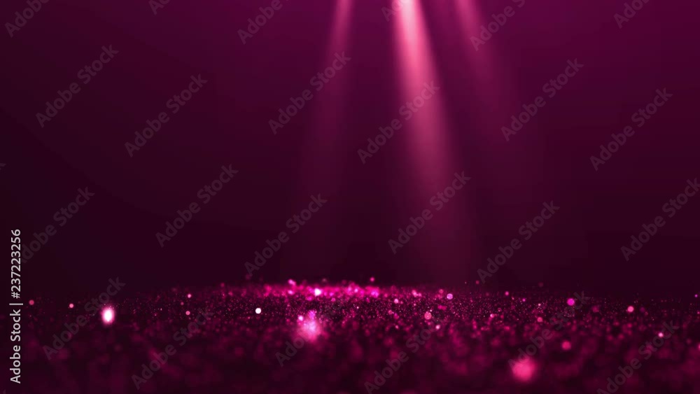 Glittering particles of ruby color with spotlights and dust on blurred ...