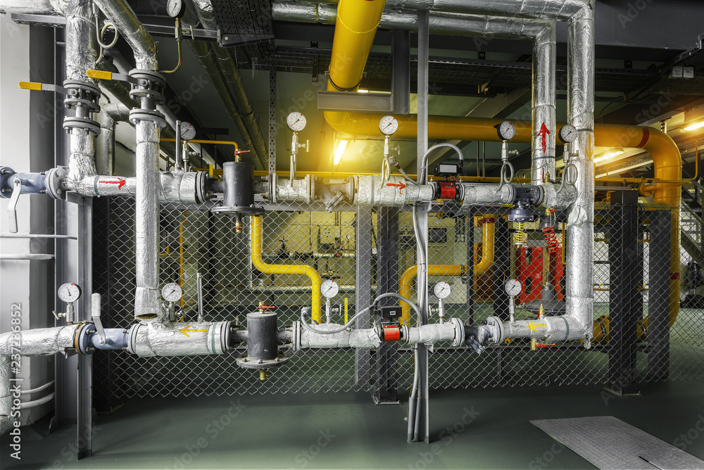 gas pipeline in yellow color with industrial high pressure gas gauge ...