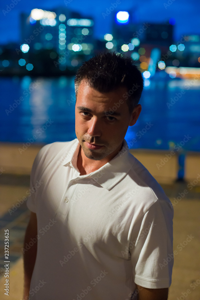 Australian man poses for picture in Brisbane, Australia. Brisbane is ...