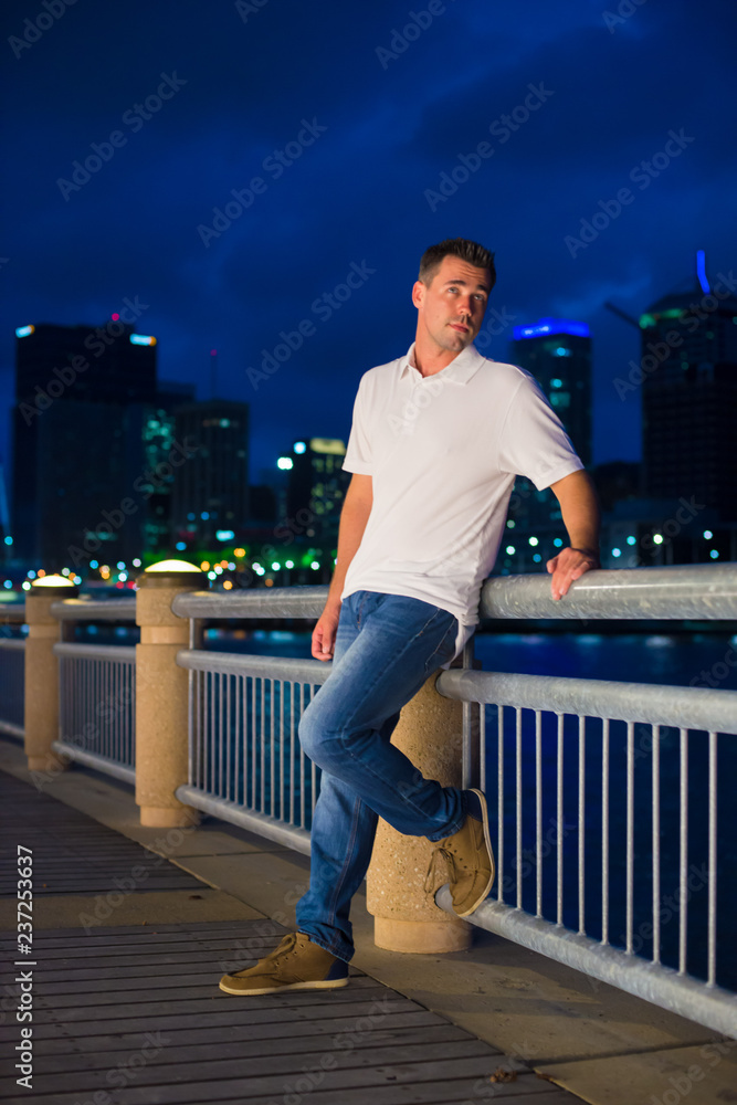 Australian man poses for picture in Brisbane, Australia. Brisbane is ...
