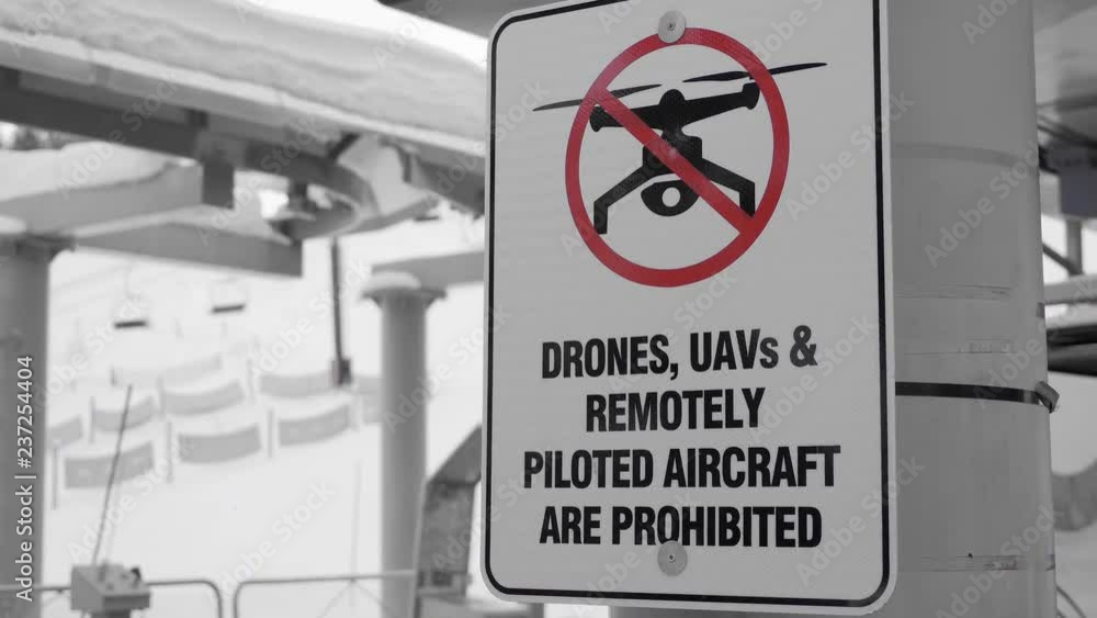 Drones, UAVs and remotely piloted aircraft prohibited. Sign at ski ...