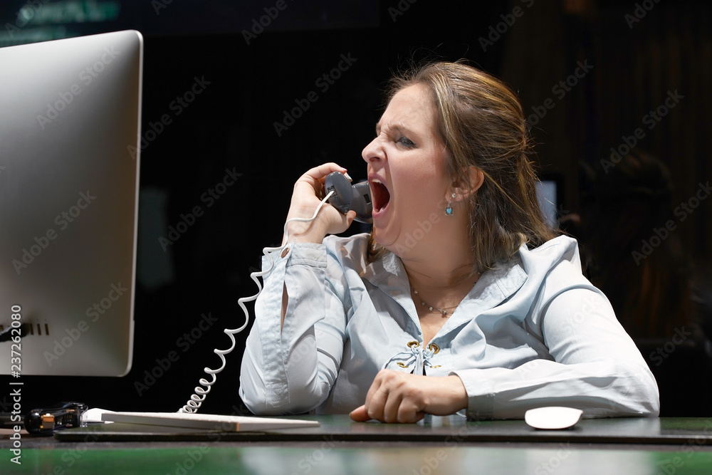 Social worker swear on the phone. Close-up of an state institution ...