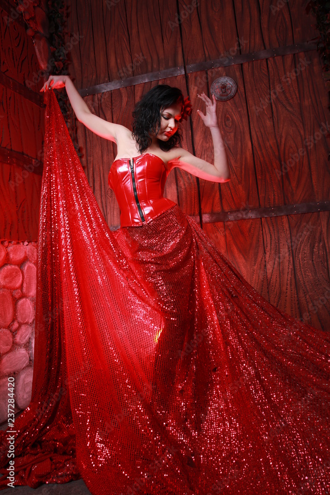 chic girl with black hair decorated by red rose pink as a pin up Gypsy ...