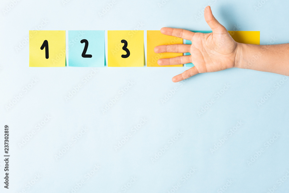 Banner counting 1-2-3. Collection of different colored sticky note ...