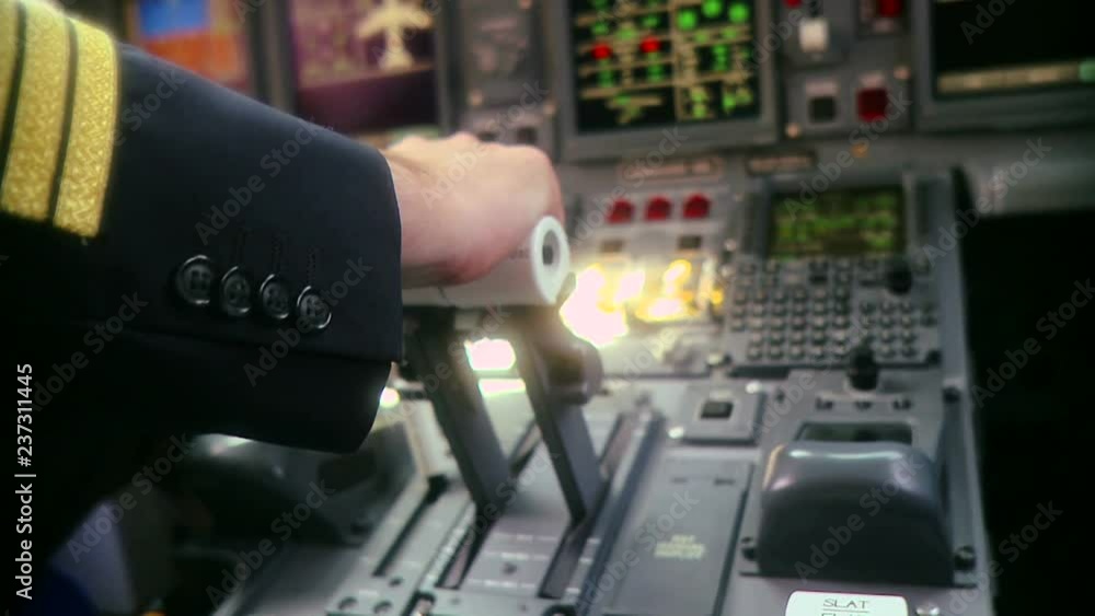 Pilot push thrust lever handle for takeoff a plane in the cockpit ...