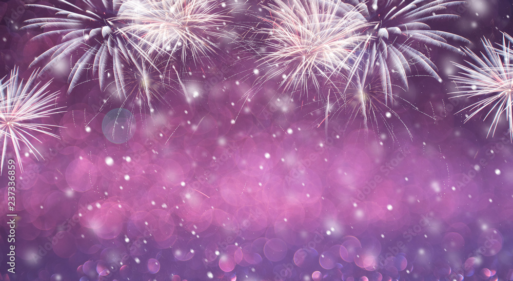 Purple fireworks and bokeh in New Year eve and copy space. Abstract ...
