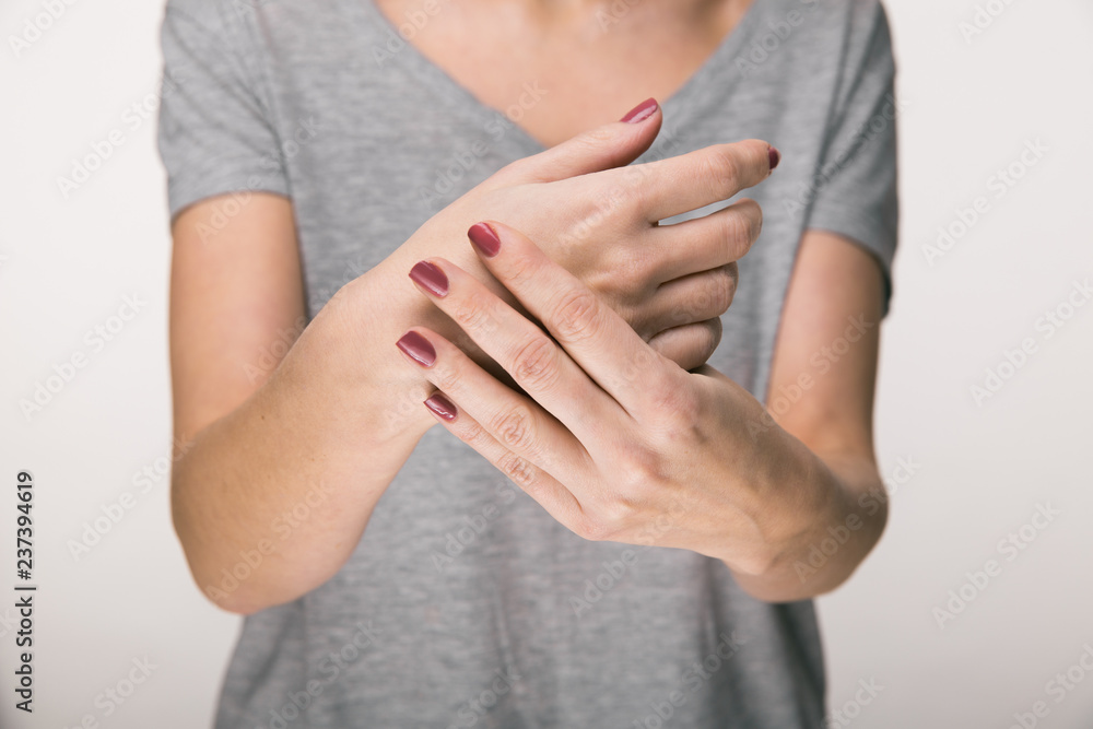Parkinson's disease symptoms. Close up of tremor (shaking) hands of ...