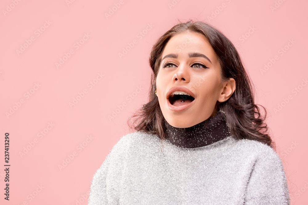 Delight. Beautiful female half-length front portrait isolated on pink ...
