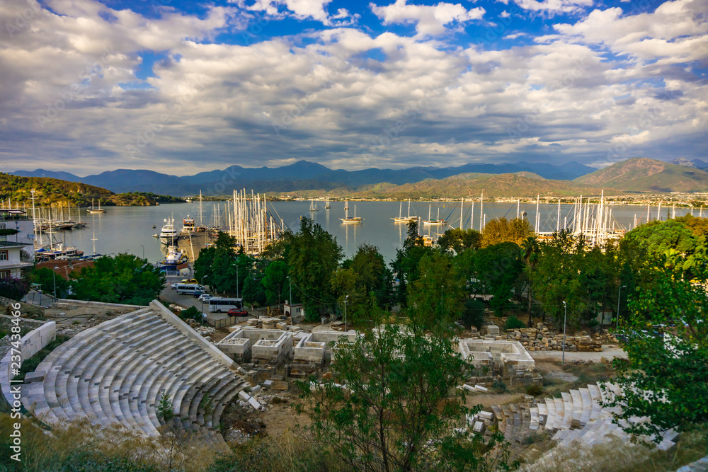 Telmessos Ancient Theater view in Fethiye. Sea, boat and mountain ...