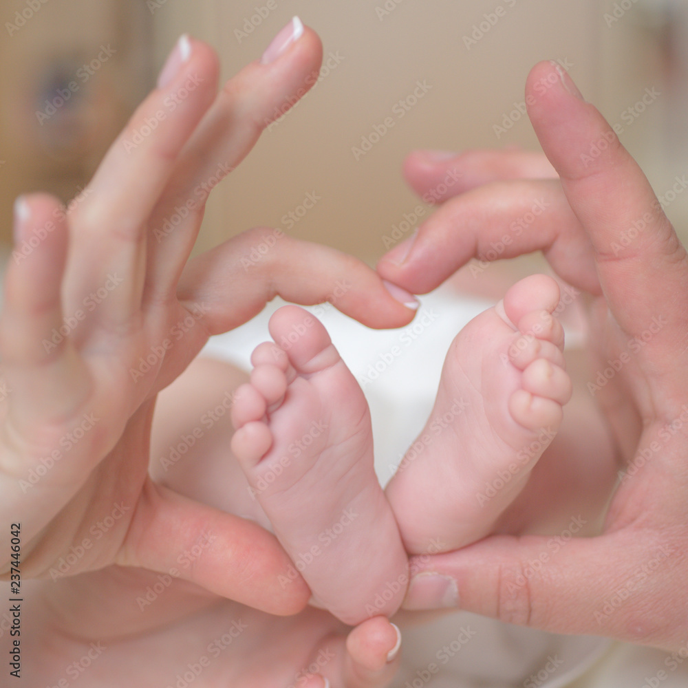 Newborn Baby Feet With Mom And Dad
