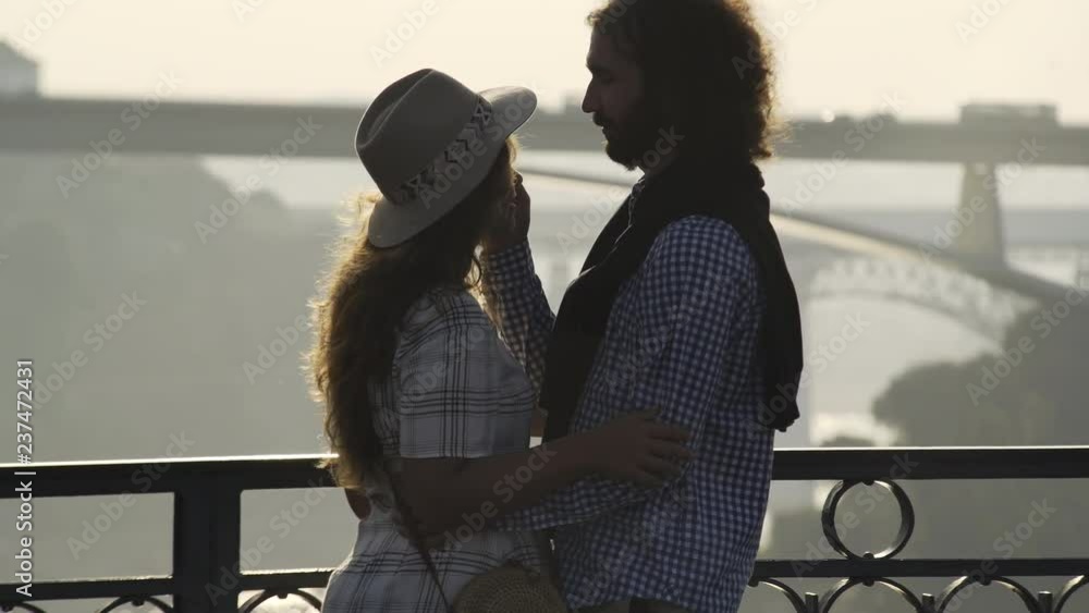 Vidéo Stock Crop view hugging and kissing couple on famous bridge Ponte ...