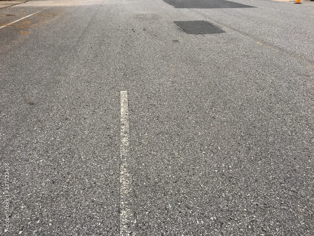 white lines on an asphalt road-narrow depth of field Stock Photo ...
