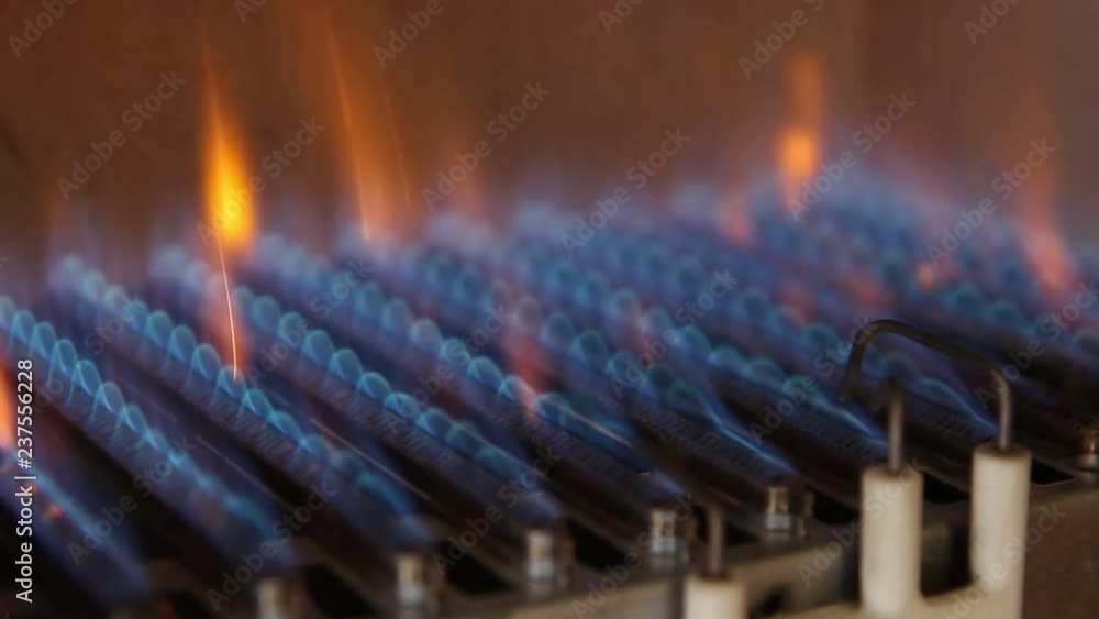 The process of ignition burner. The blue flame of a gas burner burns ...