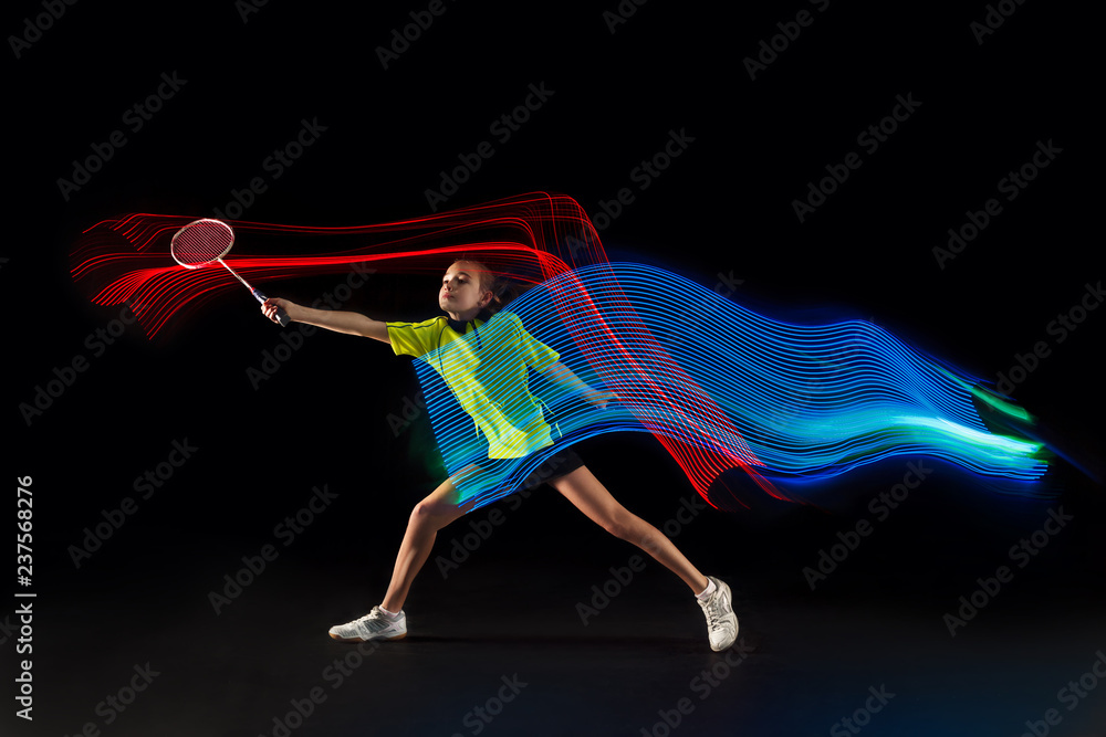 The one caucasian young teenager girl playing badminton at studio. The ...