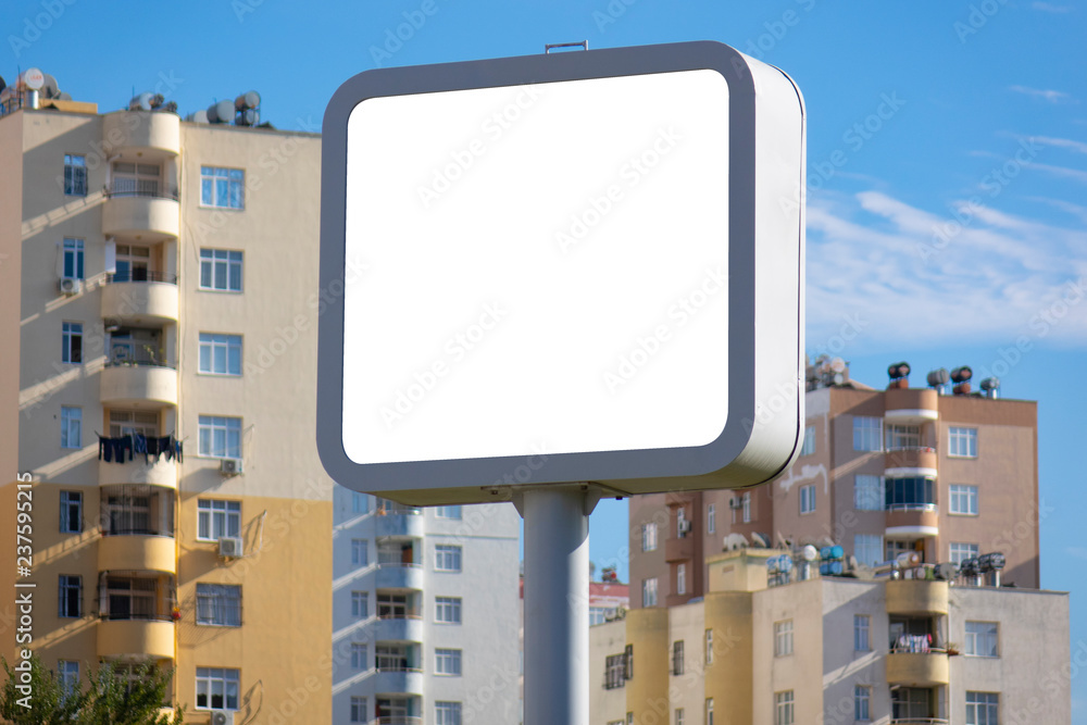 Square billboard in the city, blank template. Smaller than bulletin ...