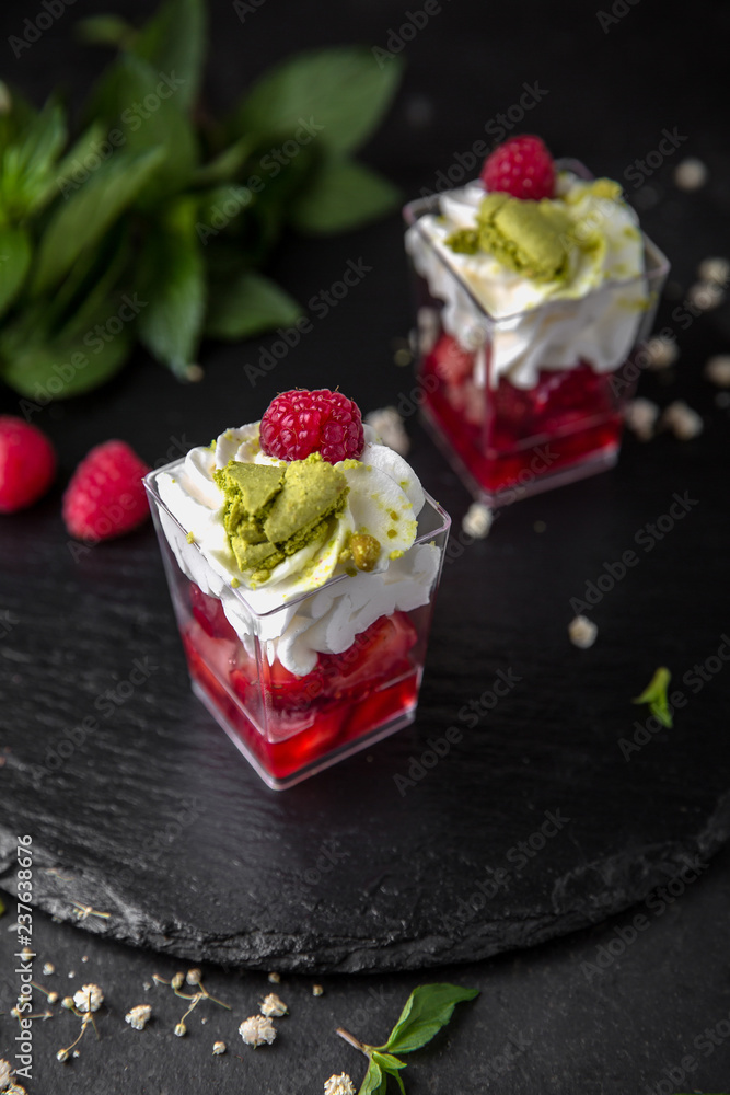 Mini dessert from fruit berry jelly, gentle mousse. Candy bar ...