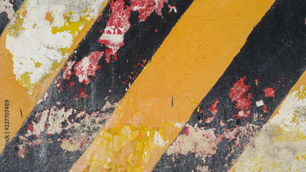 Footpath black and yellow color with brick wall background with free ...