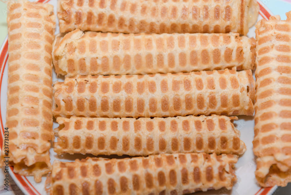 Waffles background. Waffles texture. A lot of waffles on the table ...