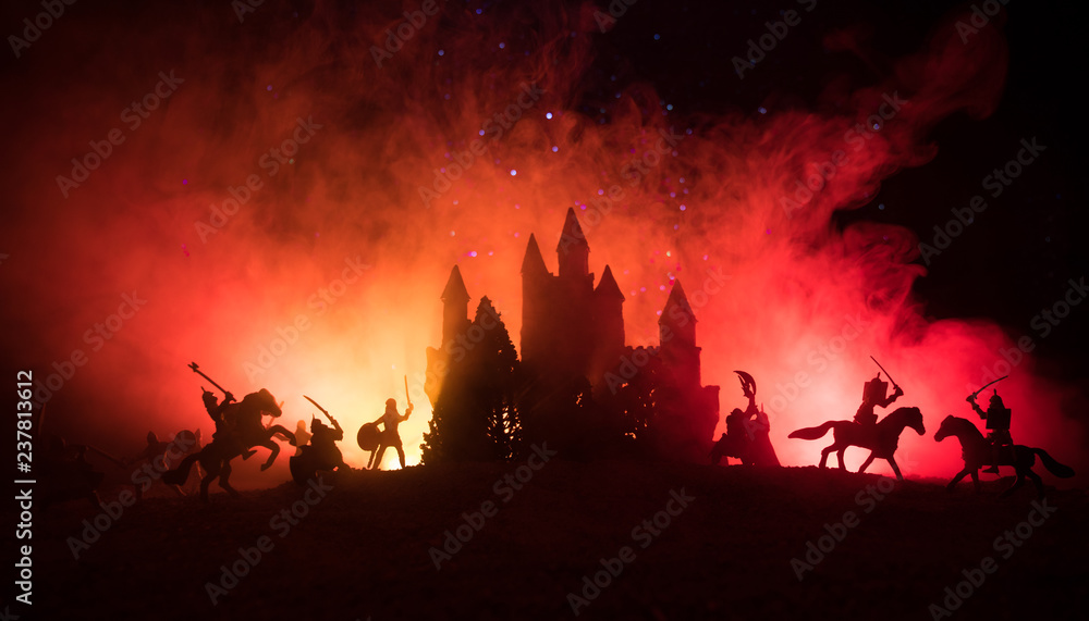 Medieval battle scene with cavalry and infantry. Silhouettes of figures ...