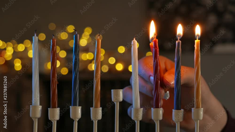 Close-up of man light hanukkah menorah Stock Video | Adobe Stock