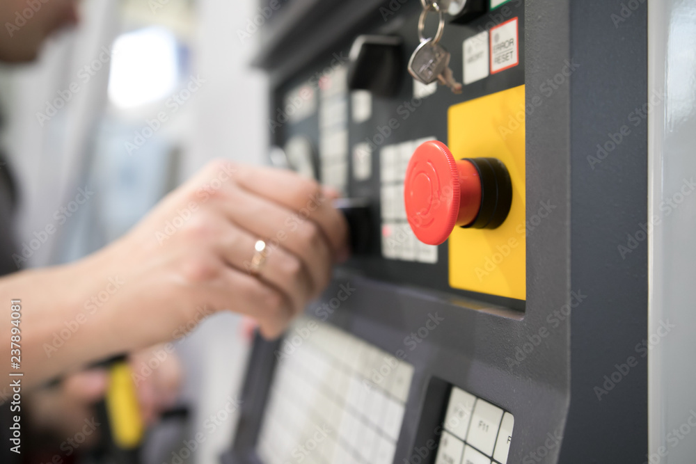 Foto de Big red button for emergency stop machinery do Stock | Adobe Stock