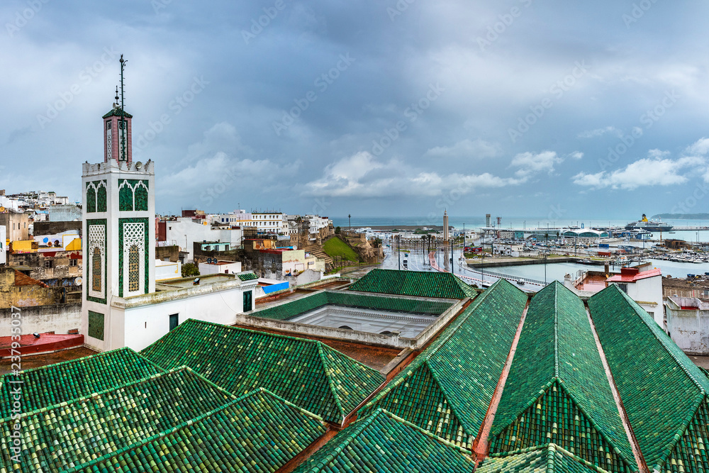 TANGIER / MOROCCO - NOVEMBER 2018: tiled roofs of buildings one of the ...