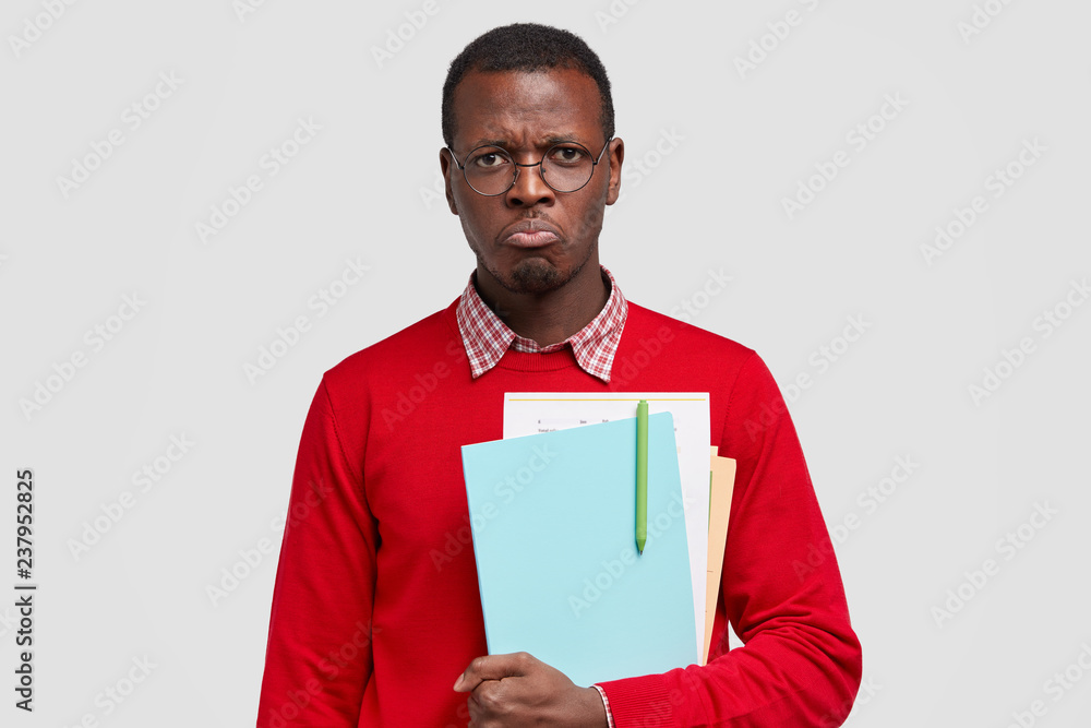 Miserable displeased offended black male college student, wants to cry ...