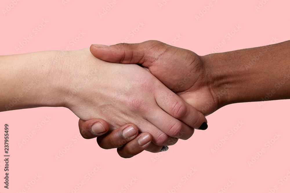 Horizontal shot of handshake between African American man and Caucasian ...