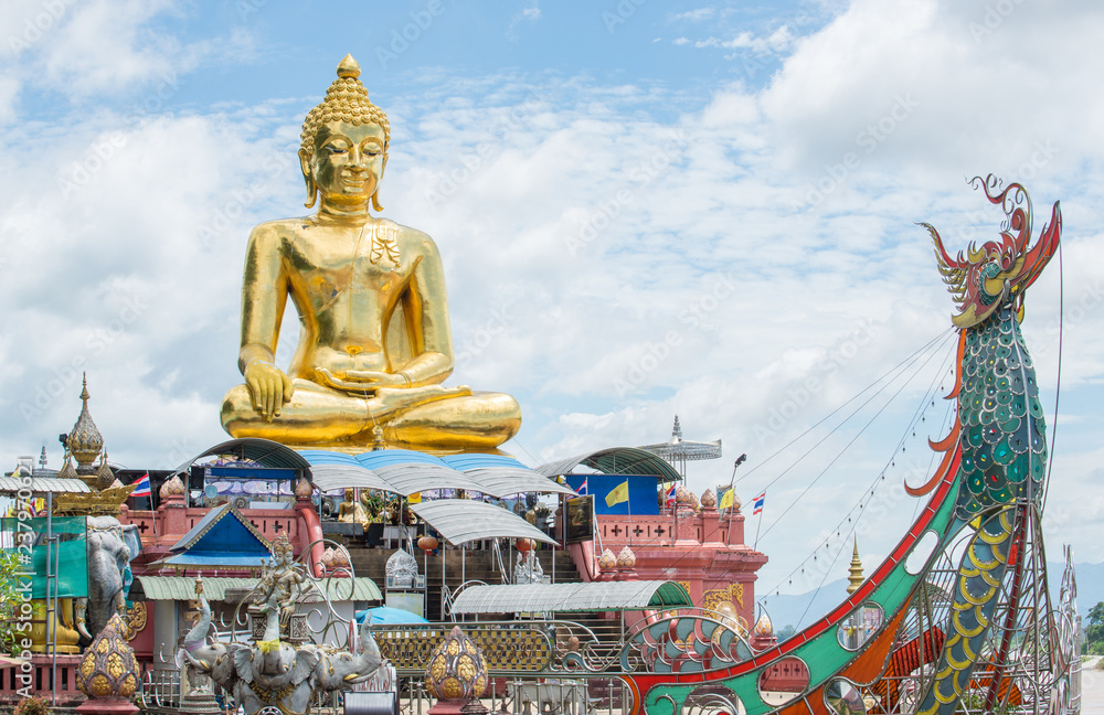 Big golden Buddha statue with Lanna style located at Golden triangle ...