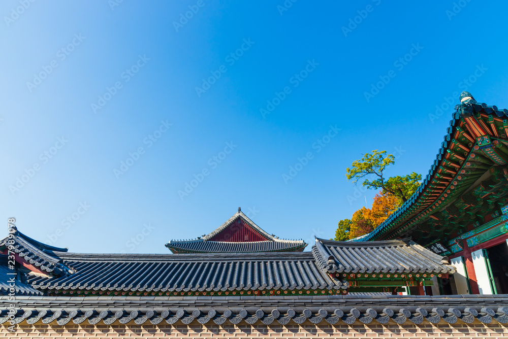 Traditional Korean Brick Wall with Blue Ceramic Roof and Roof of ...