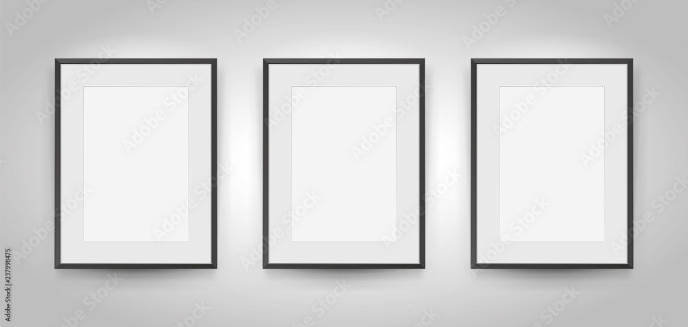 Three realistic empty rectangular black frames with passepartout on ...