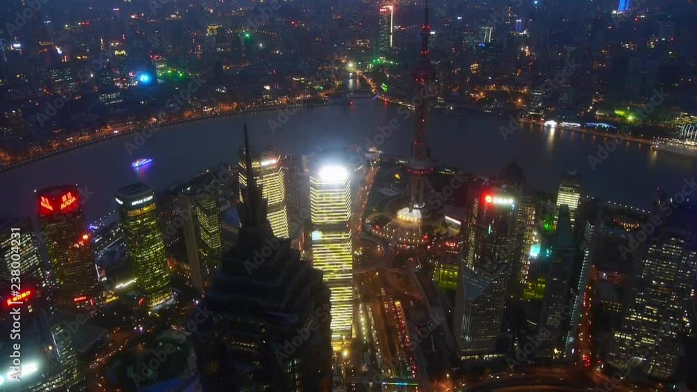Video Stock Elevated view of high-rise buildings with river at night in ...