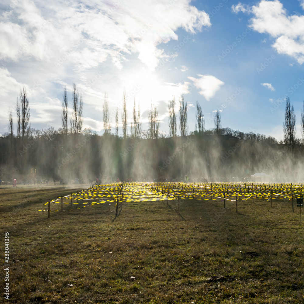Barrier tape crawling obstacle at an obstacle course race, beautiful ...