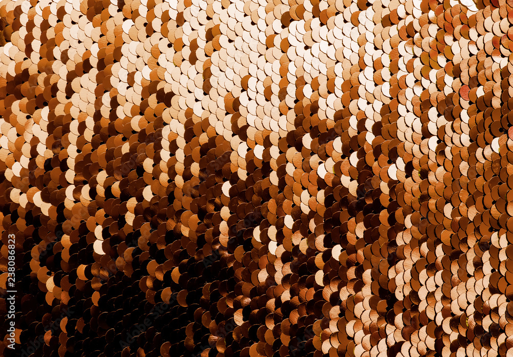 festive background with shimmering round small beautiful shiny gold ...